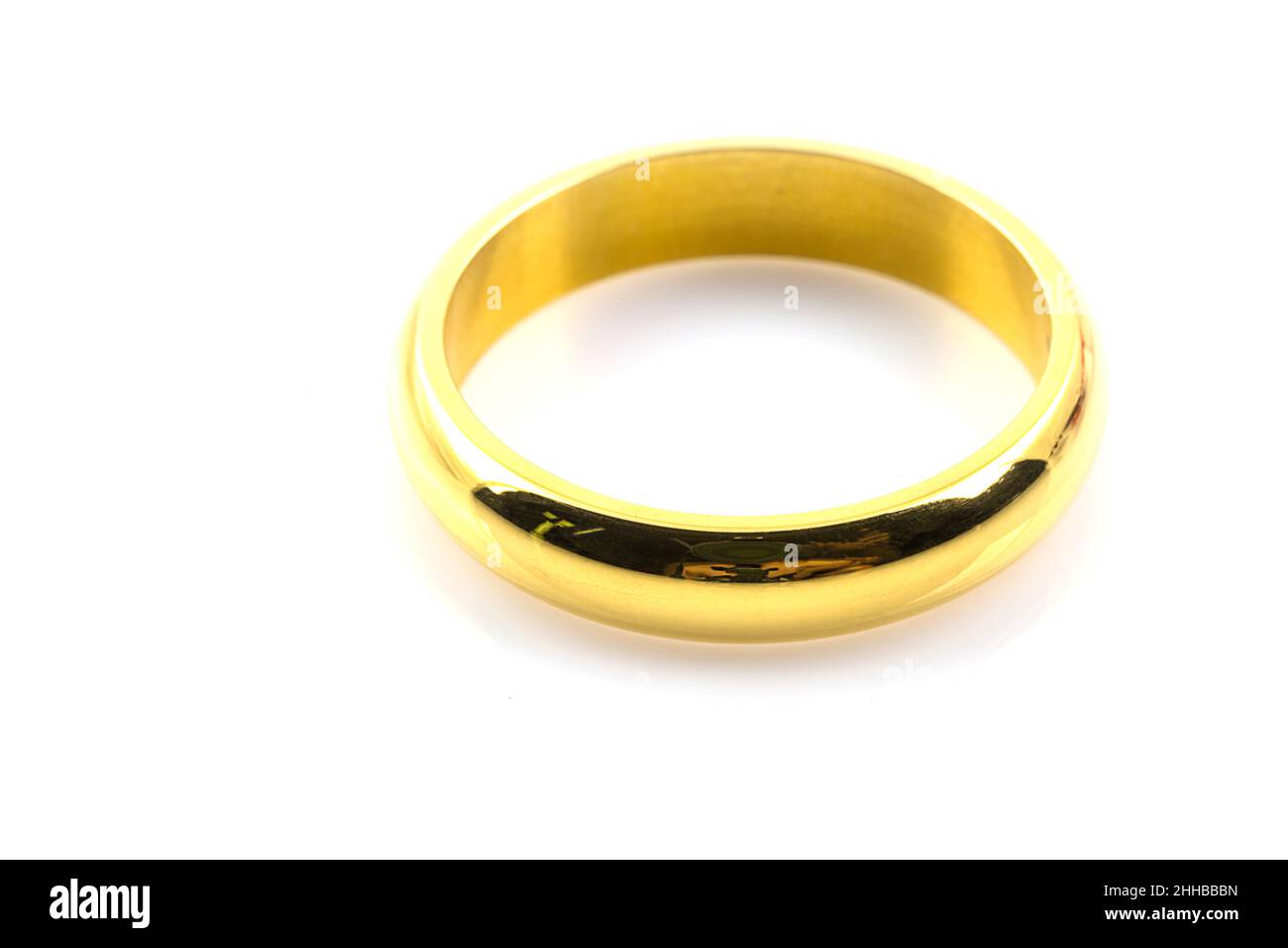 golden wedding ring isolated on white background Stock Photo - Alamy