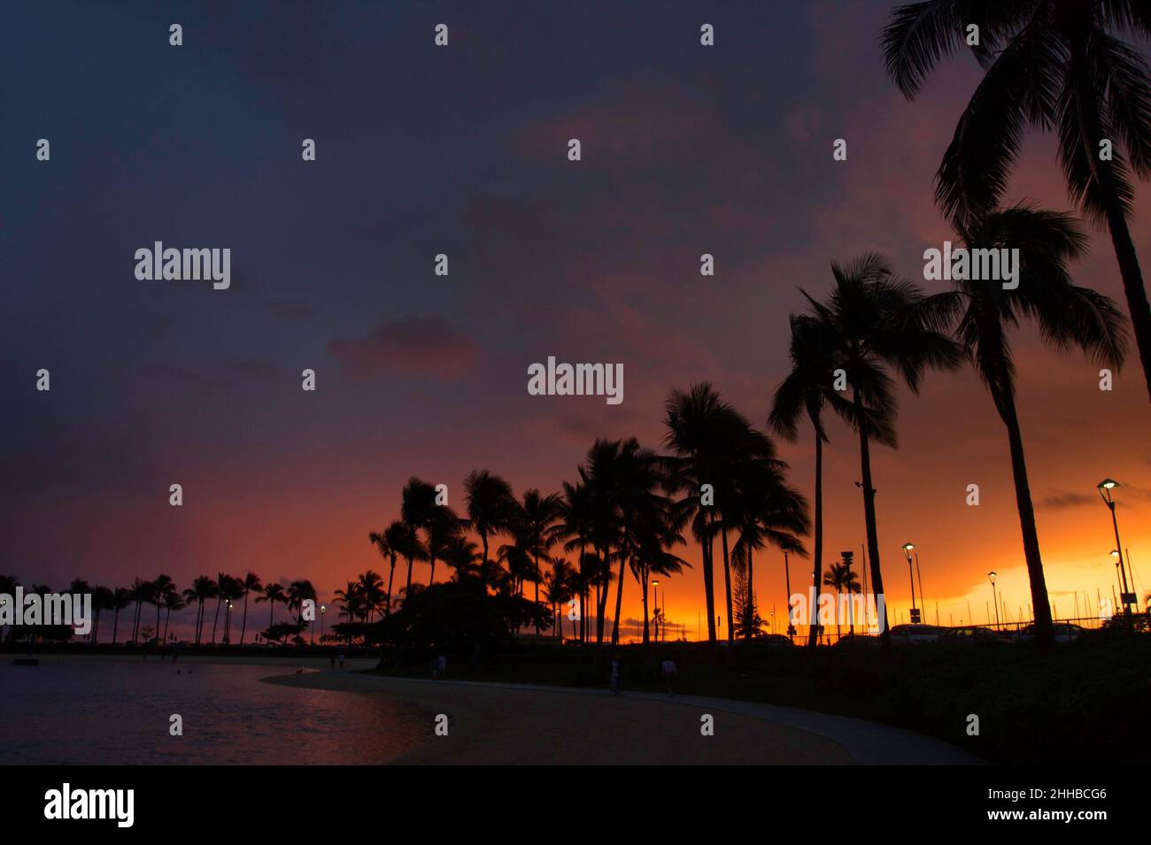 Colorful Sunset at Waikiki on Oahu, Hawaii Stock Photo - Alamy