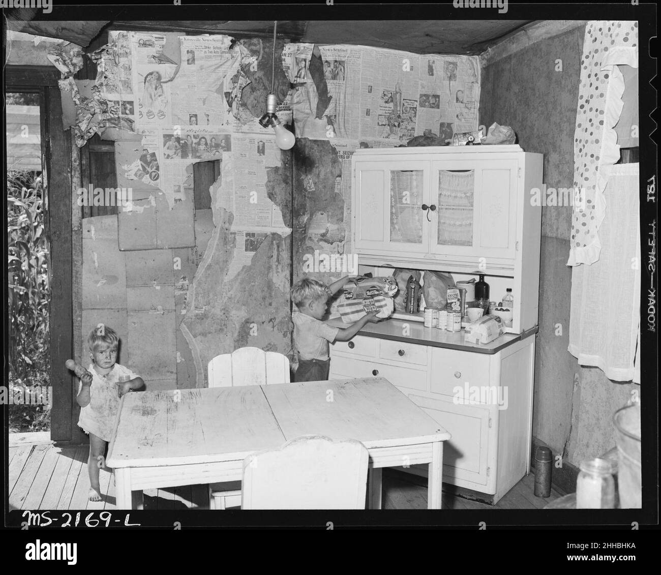 Son of andrew broughton arrives home from the store hi-res stock ...