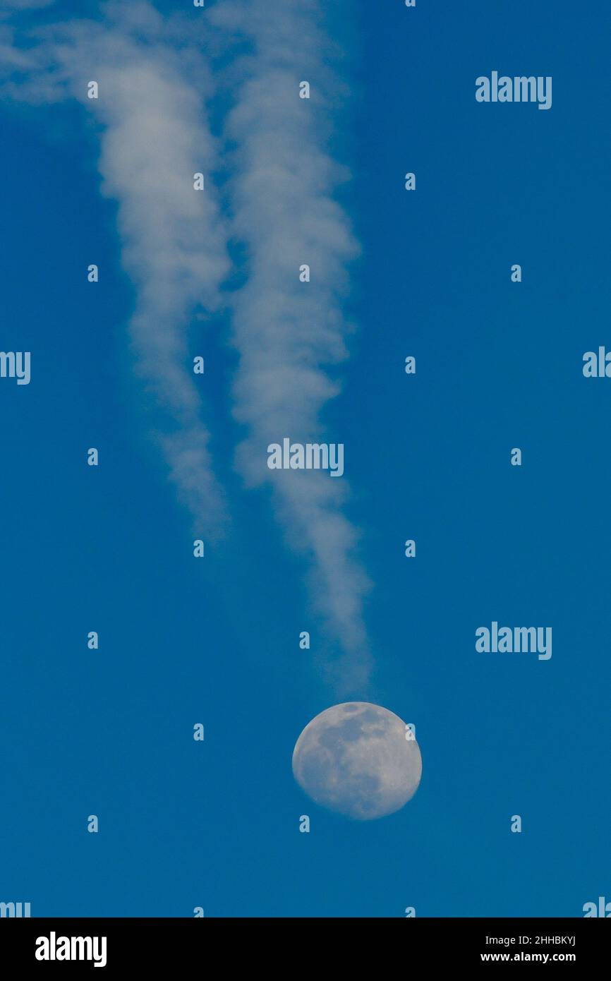 Photo of the Full Moon with Contrails, Early Spring 2020 Stock Photo ...