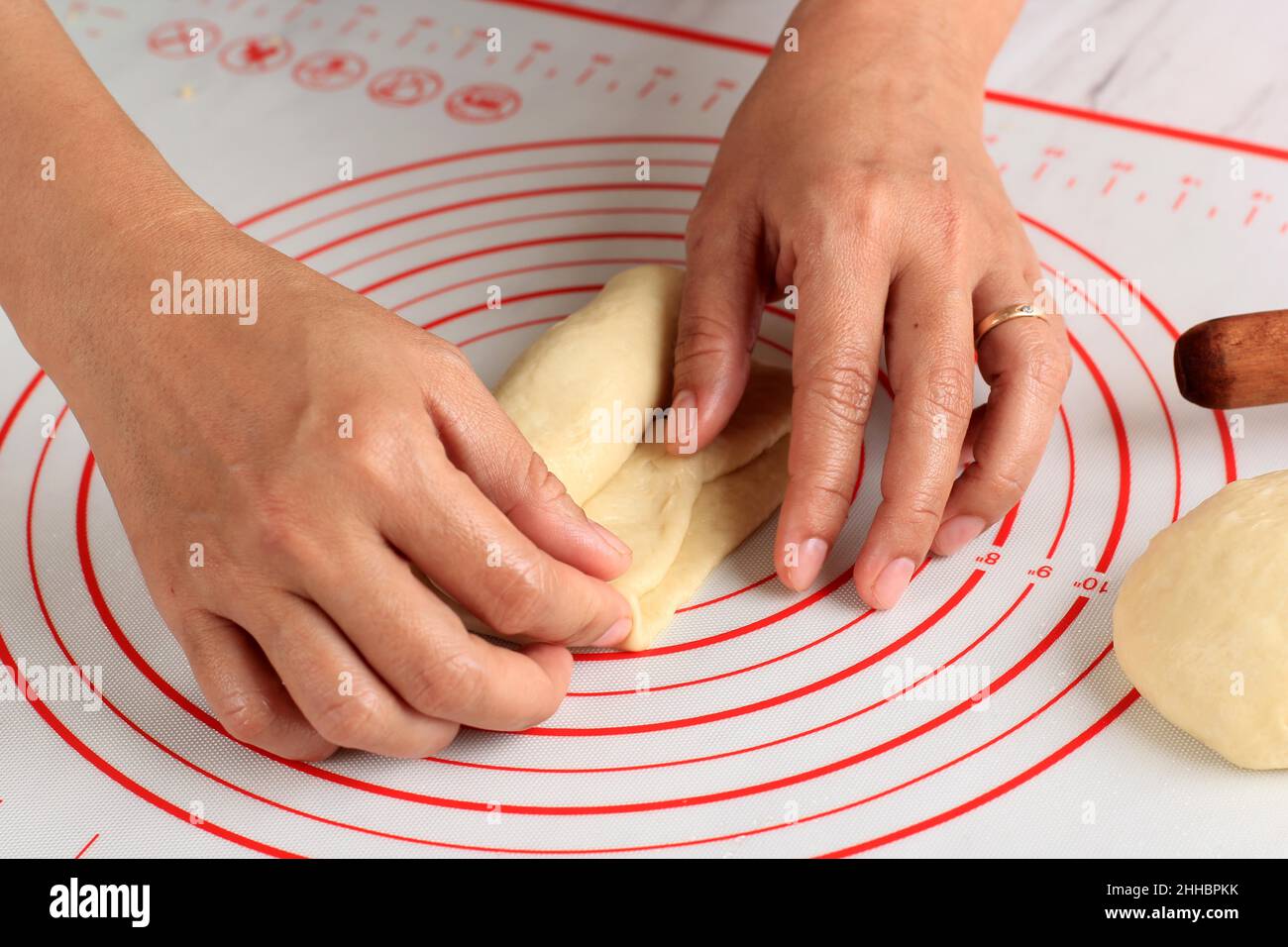 Baker Hand Folding Bread Dough, Baking Step by Step Stock Photo - Alamy