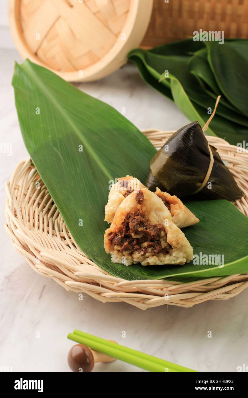 Chinese rice dumplings wrapped hi-res stock photography and images - Alamy