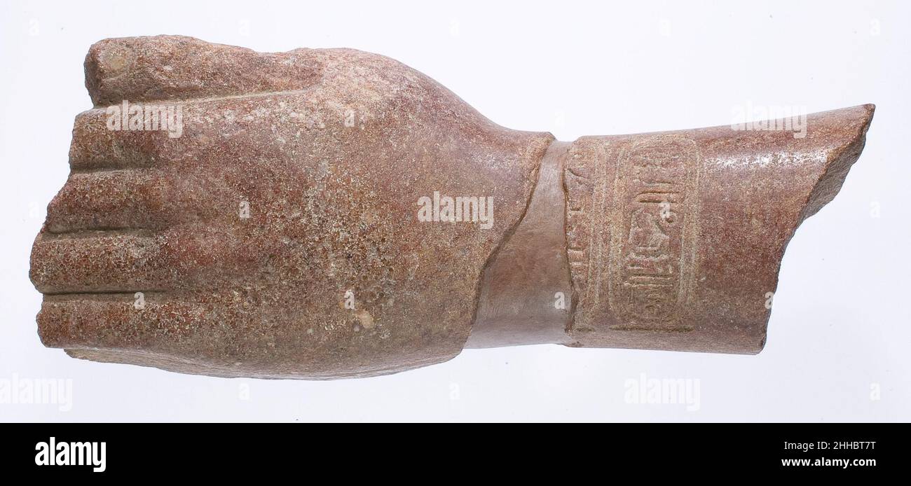 left hand and arm fragment with Aten cartouches from a statue ...