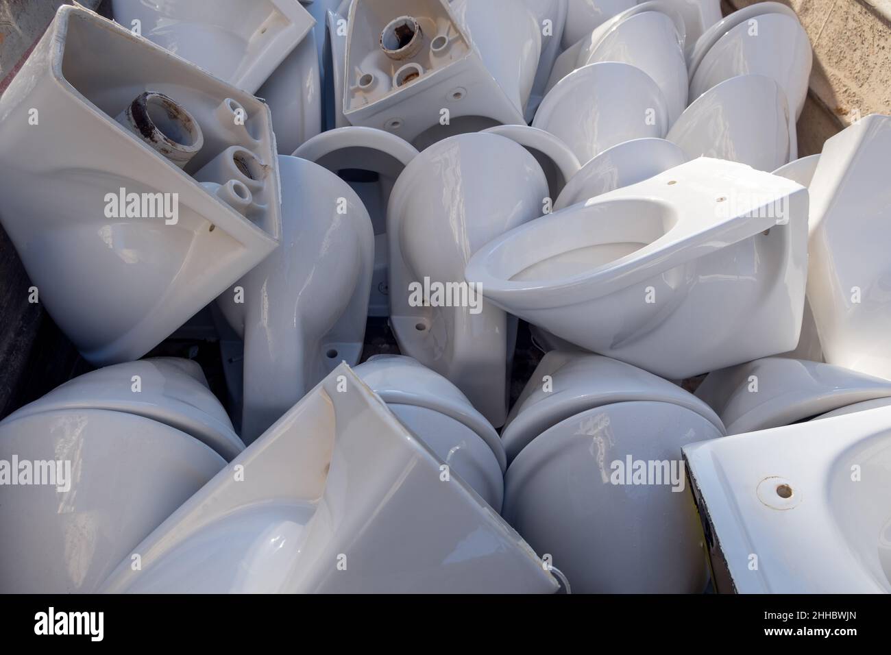 Toilet bowls Removed for renovation of apartments. Construction waste ...