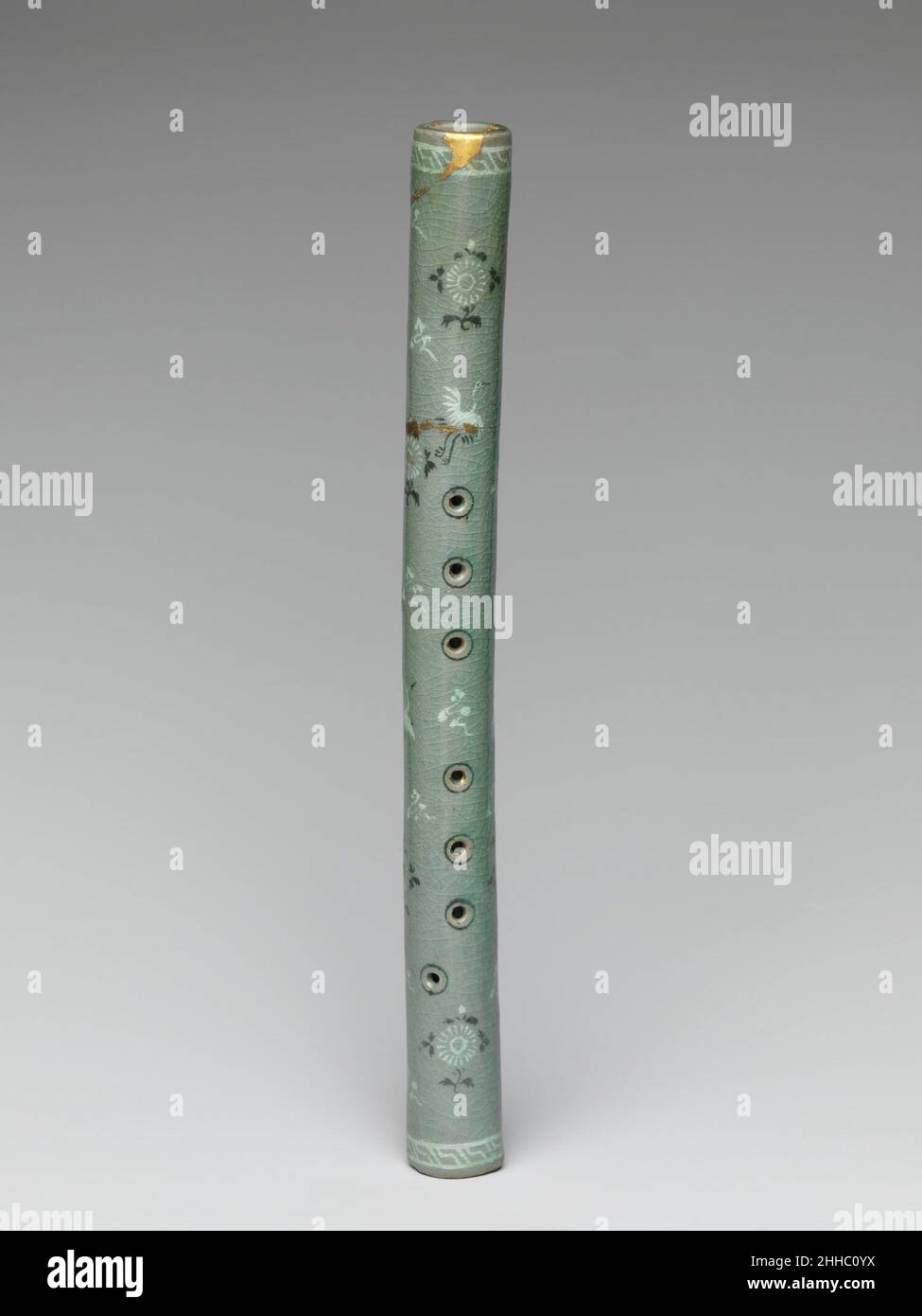 Vertical flute decorated with chrysanthemums, cranes, and clouds early ...