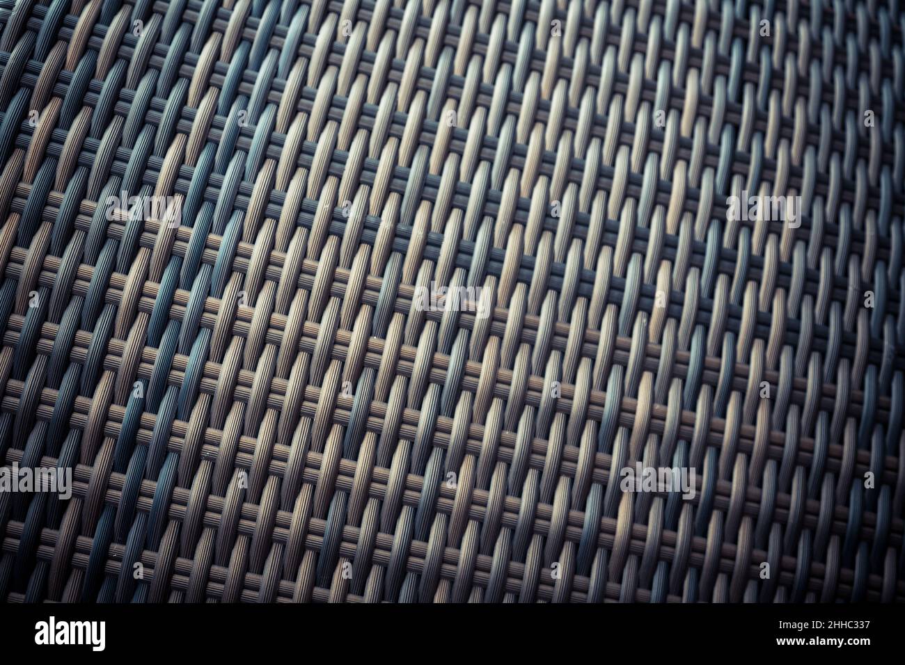 Synthetic rattan texture weaving background as used on outdoor garden ...