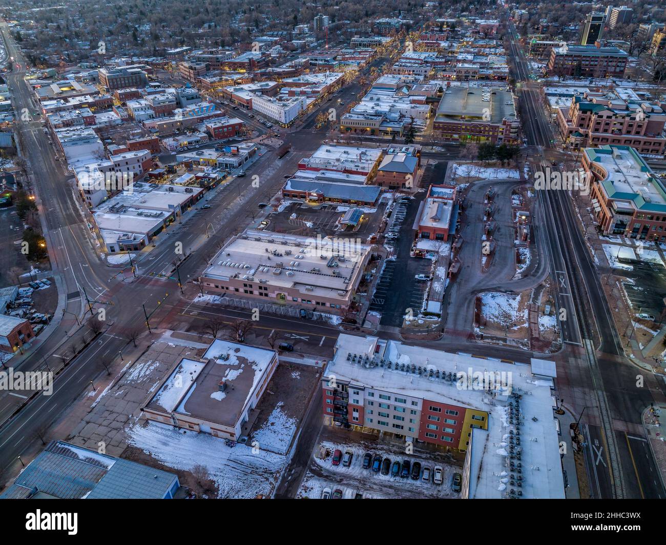 winter dawn over Fort Collins, Colorado - aerial view of downtown with ...