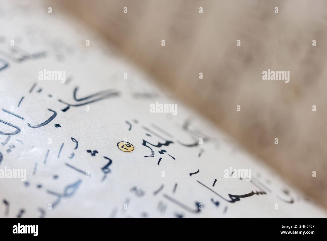 Closeup of Arabic calligraphy on page of open book Stock Photo - Alamy