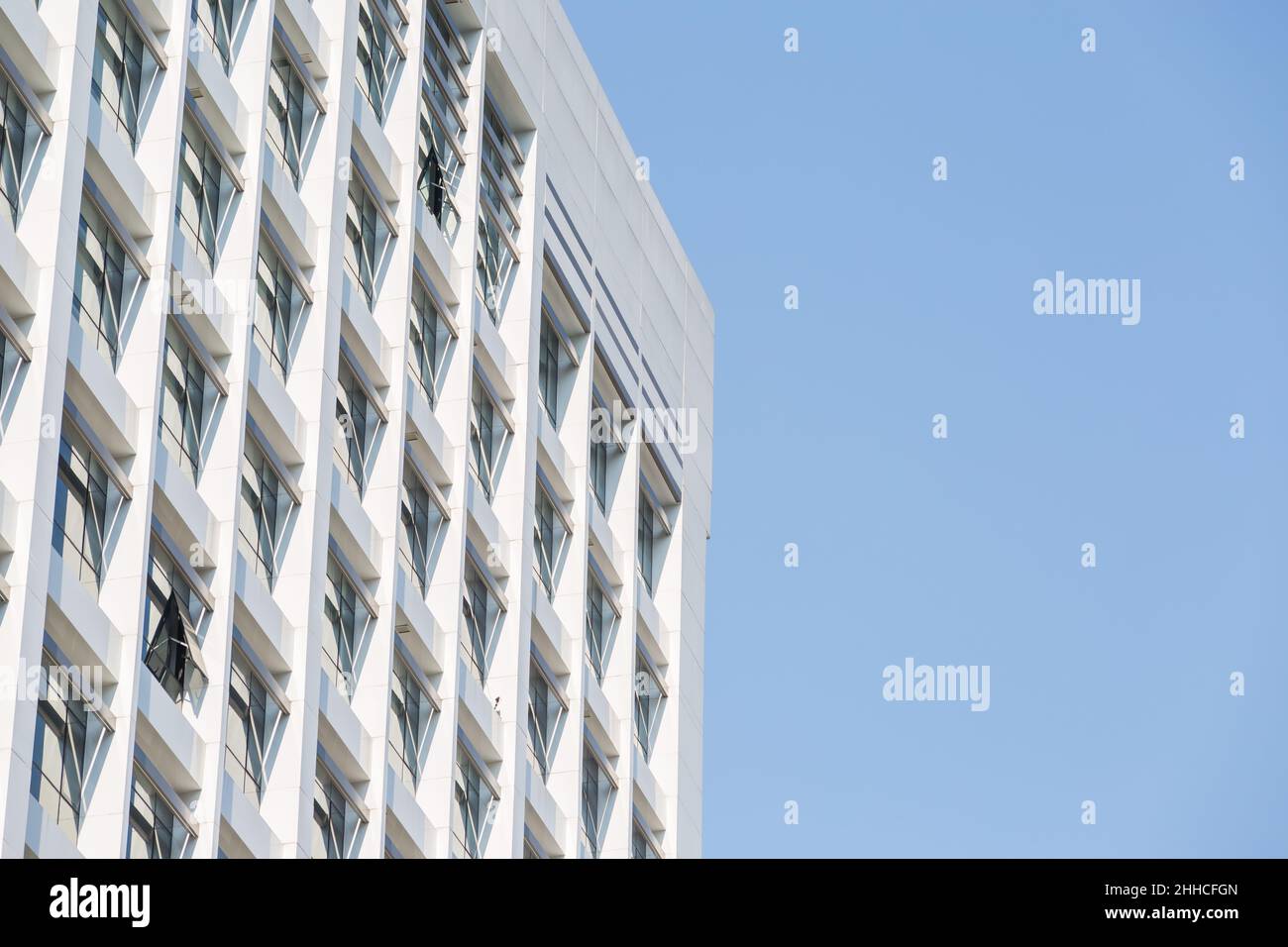 Windows of white building background Stock Photo - Alamy