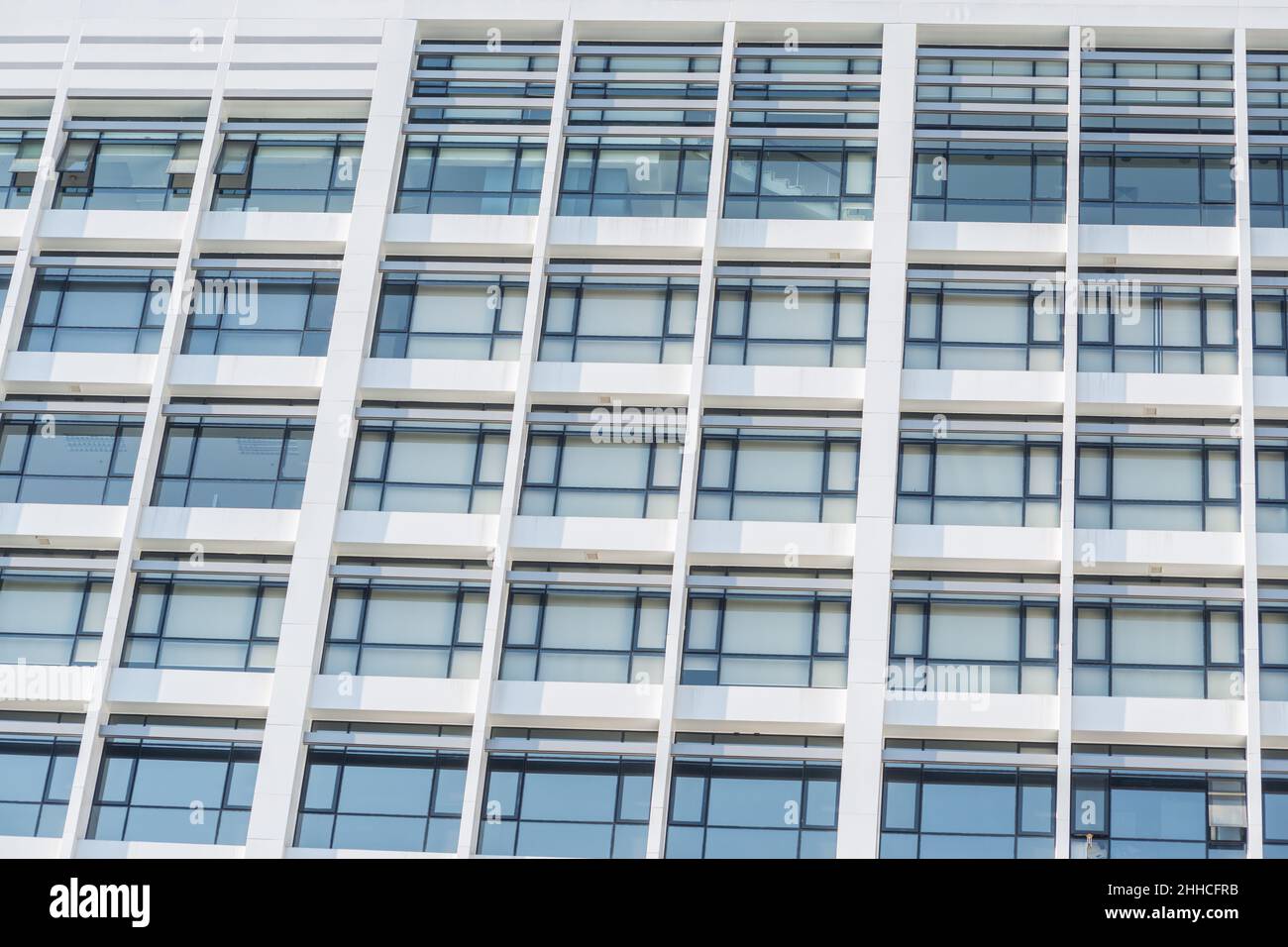 Windows of white building background Stock Photo - Alamy