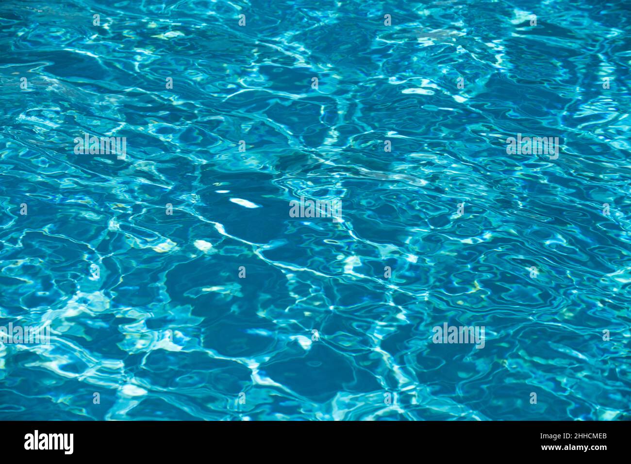 Water in swimming pool, background with high resolution. Wave abstract or rippled water texture ...