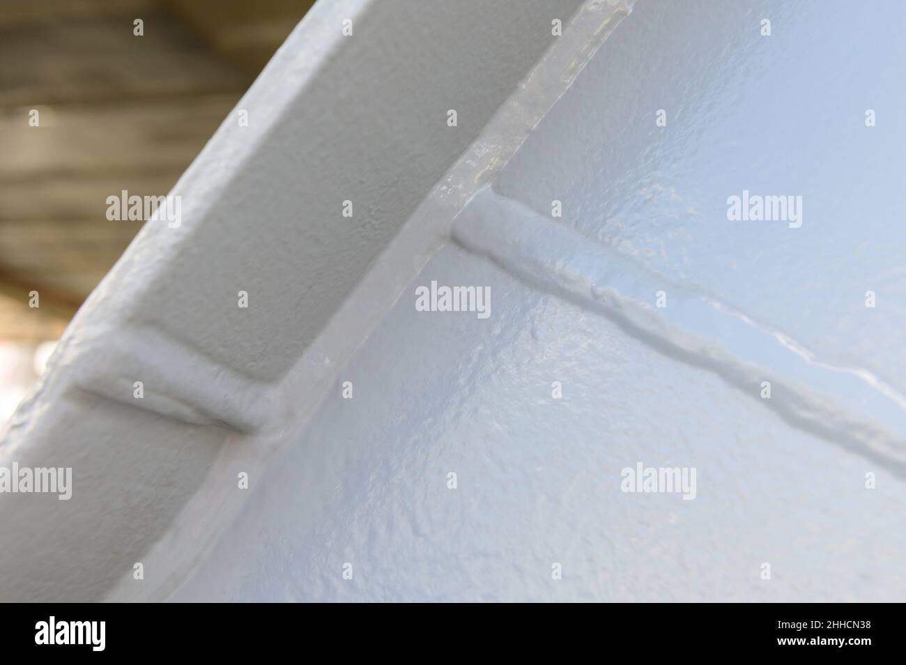 Two metal plates welded together as a background Stock Photo - Alamy