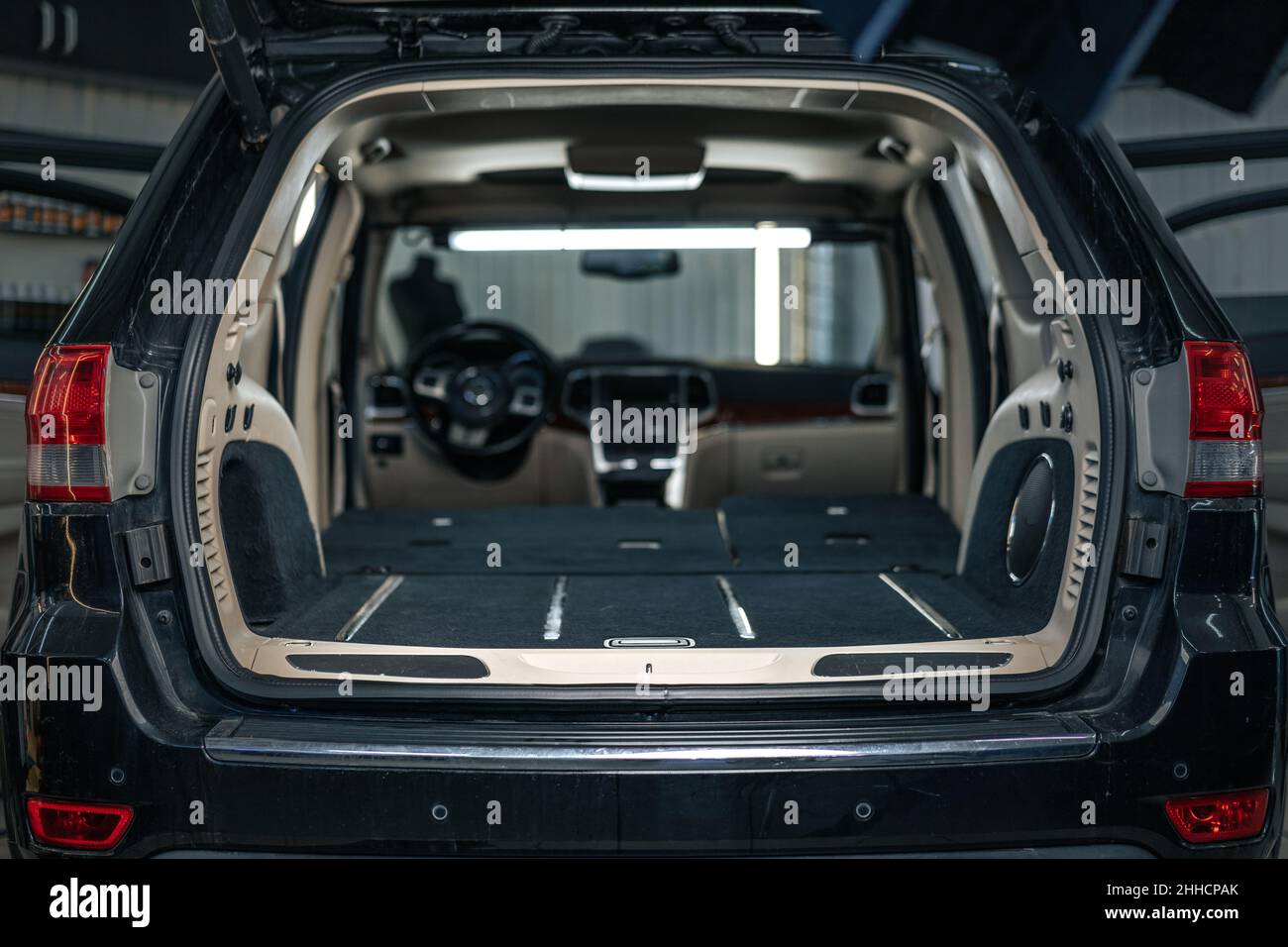 Clean open empty car trunk in the car detailing service Stock Photo - Alamy