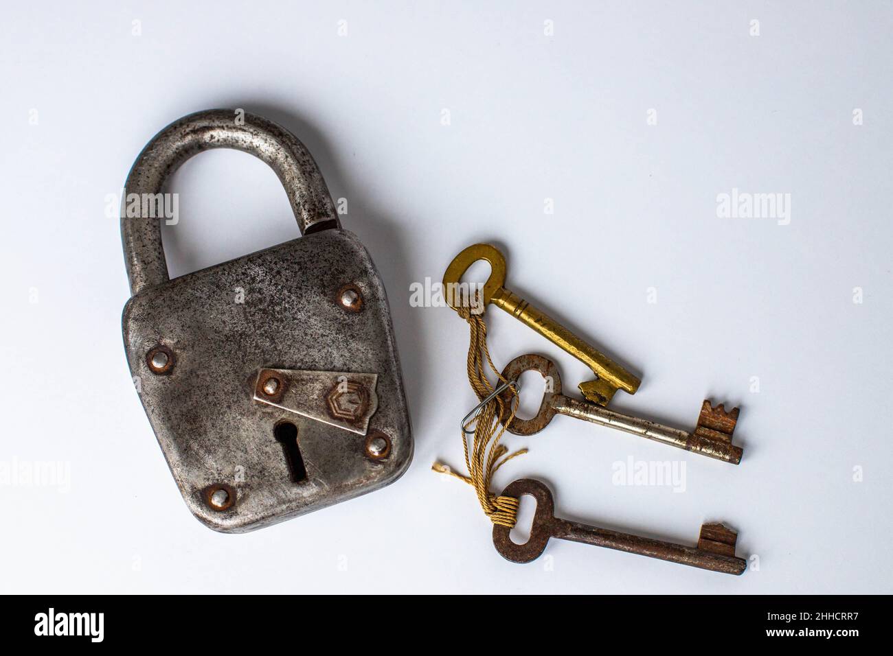 Vintage lock with three keys Stock Photo - Alamy