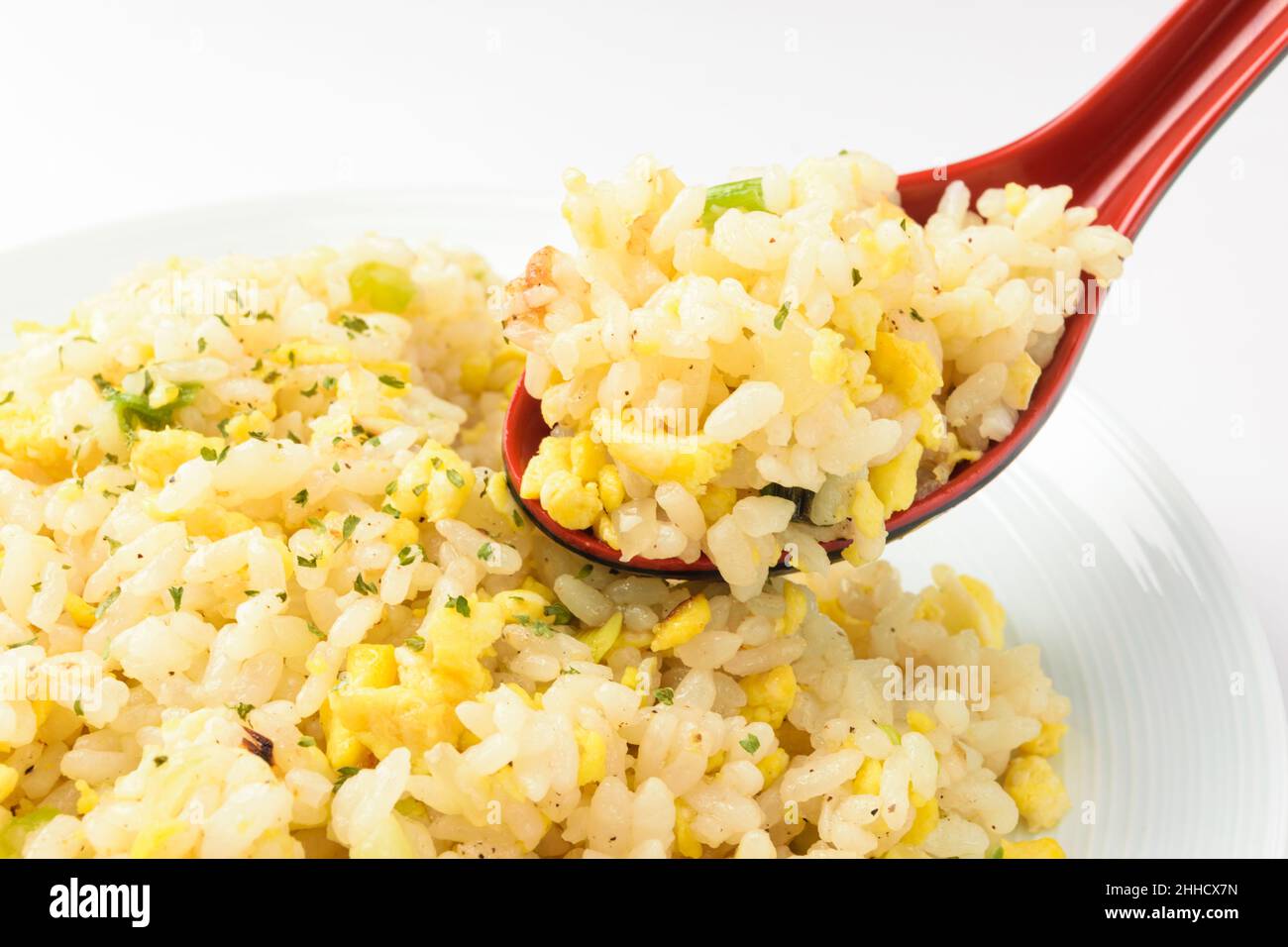 Seasoned fried rice on white background Stock Photo - Alamy