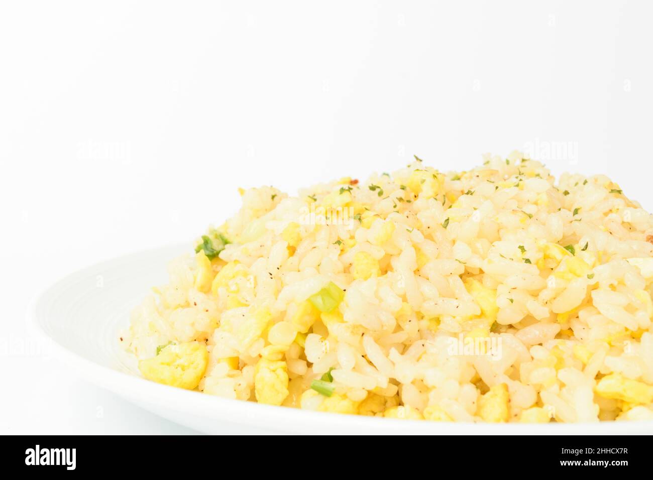Seasoned fried rice on white background Stock Photo - Alamy