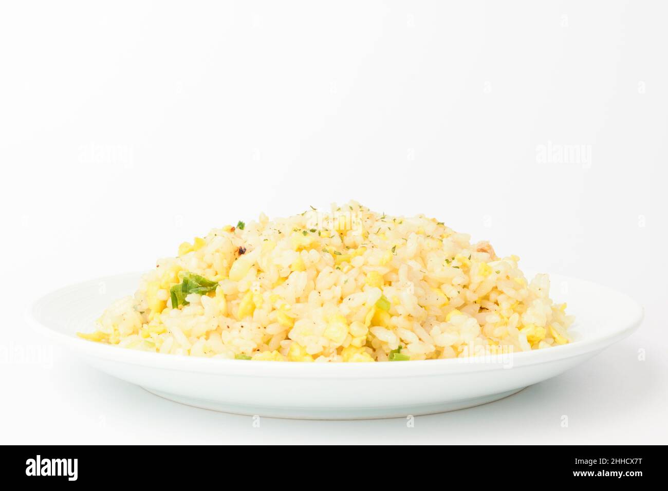 Seasoned fried rice on white background Stock Photo - Alamy