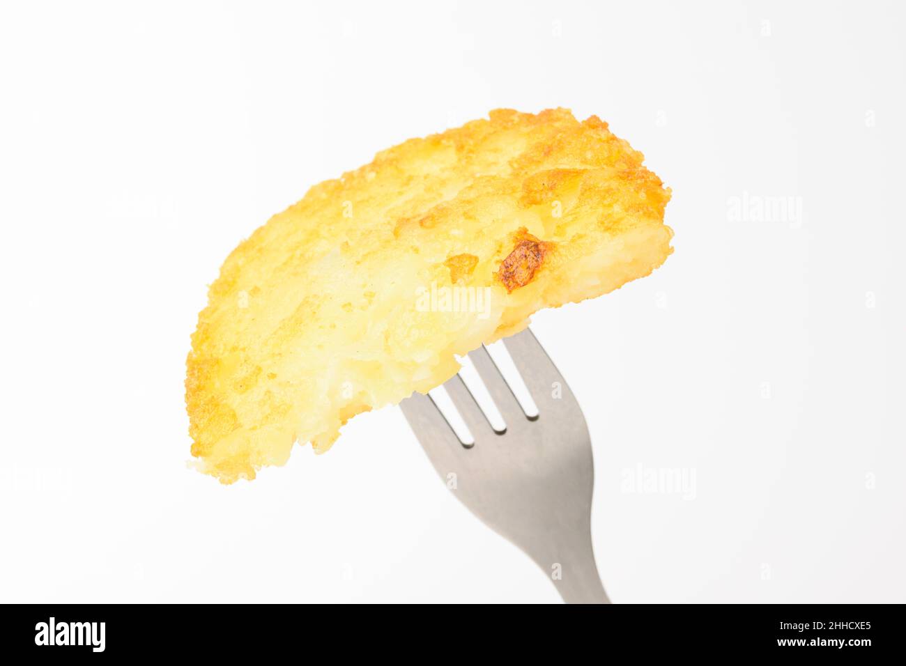 Hash brown on white background Stock Photo - Alamy
