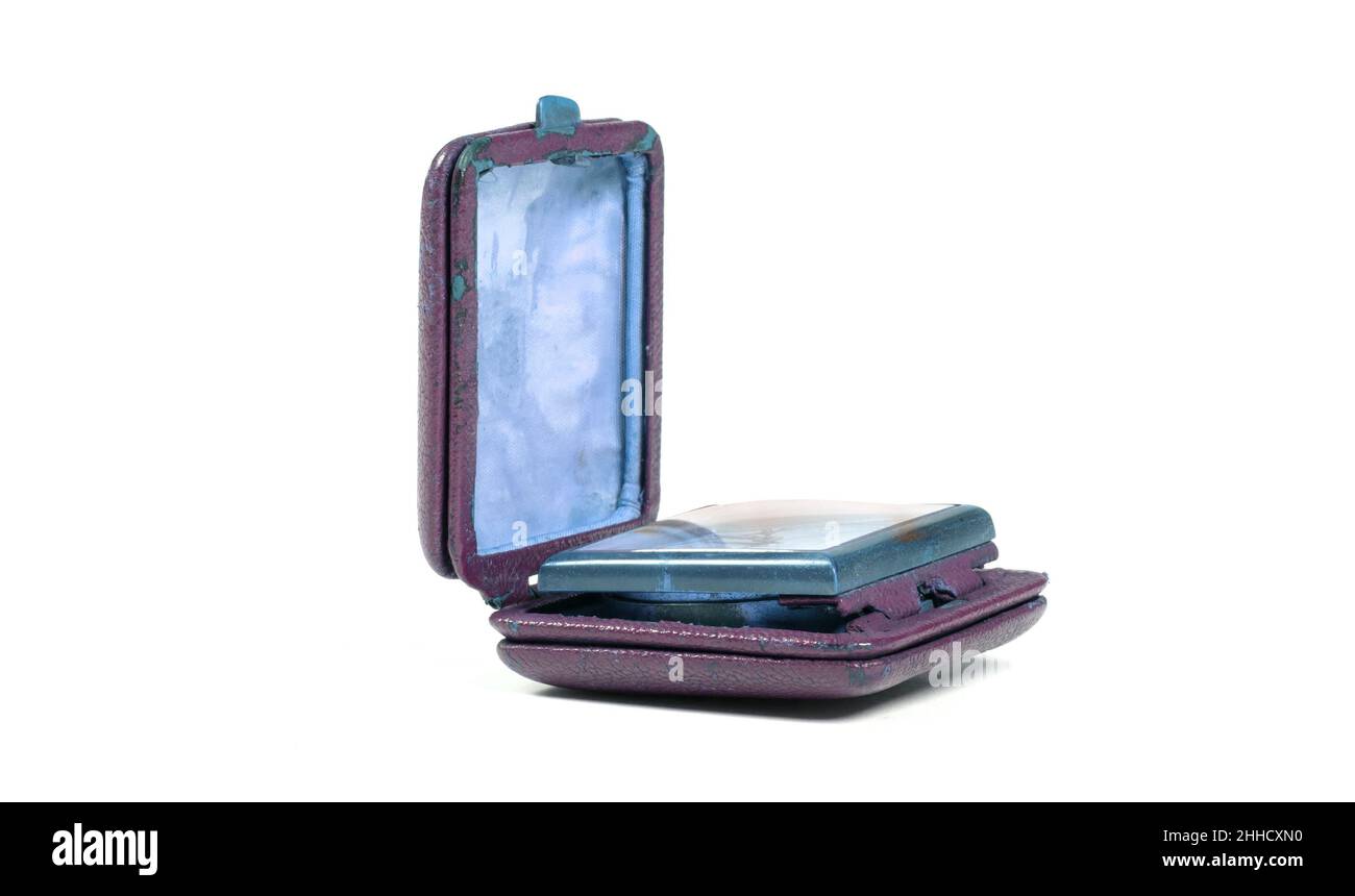 Old purple folding travel alarm clock on white background Stock Photo ...