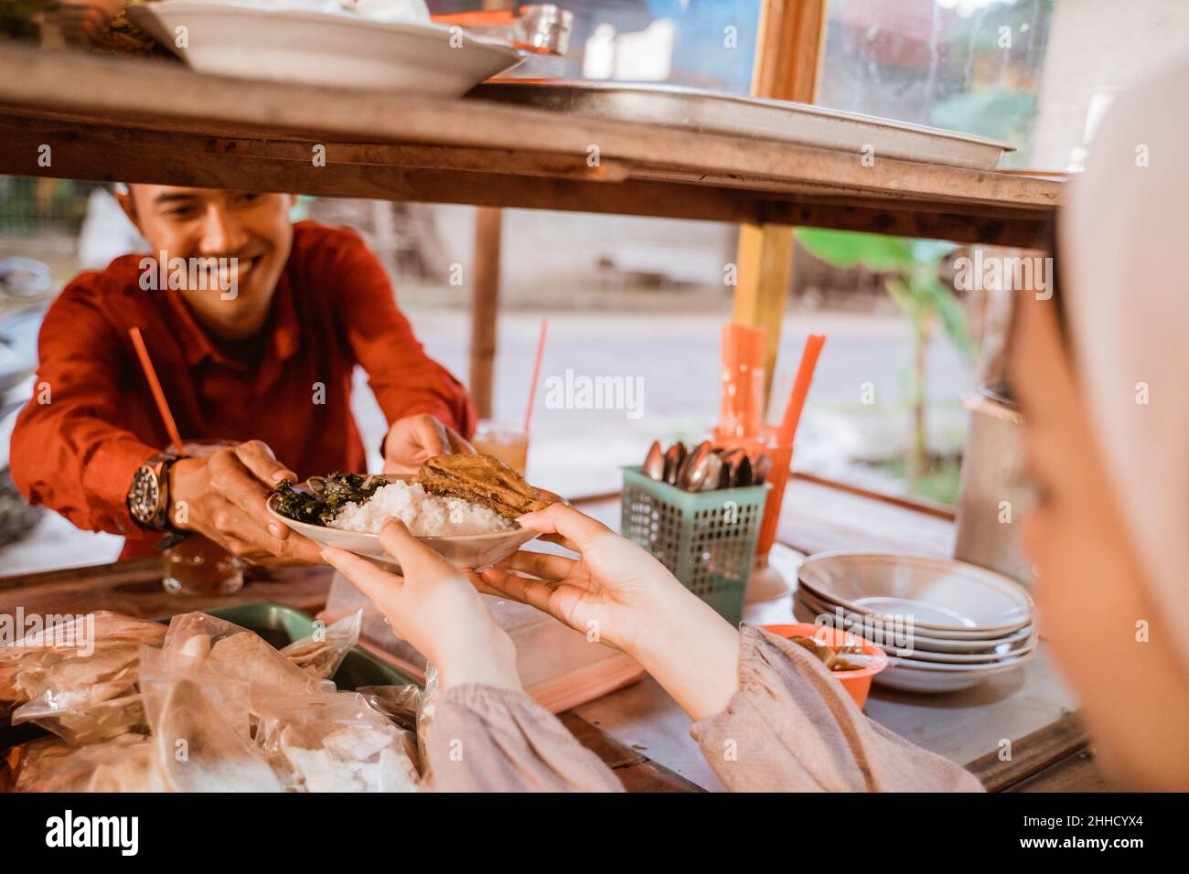 muslim asian woman preparing her food stall Stock Photo - Alamy