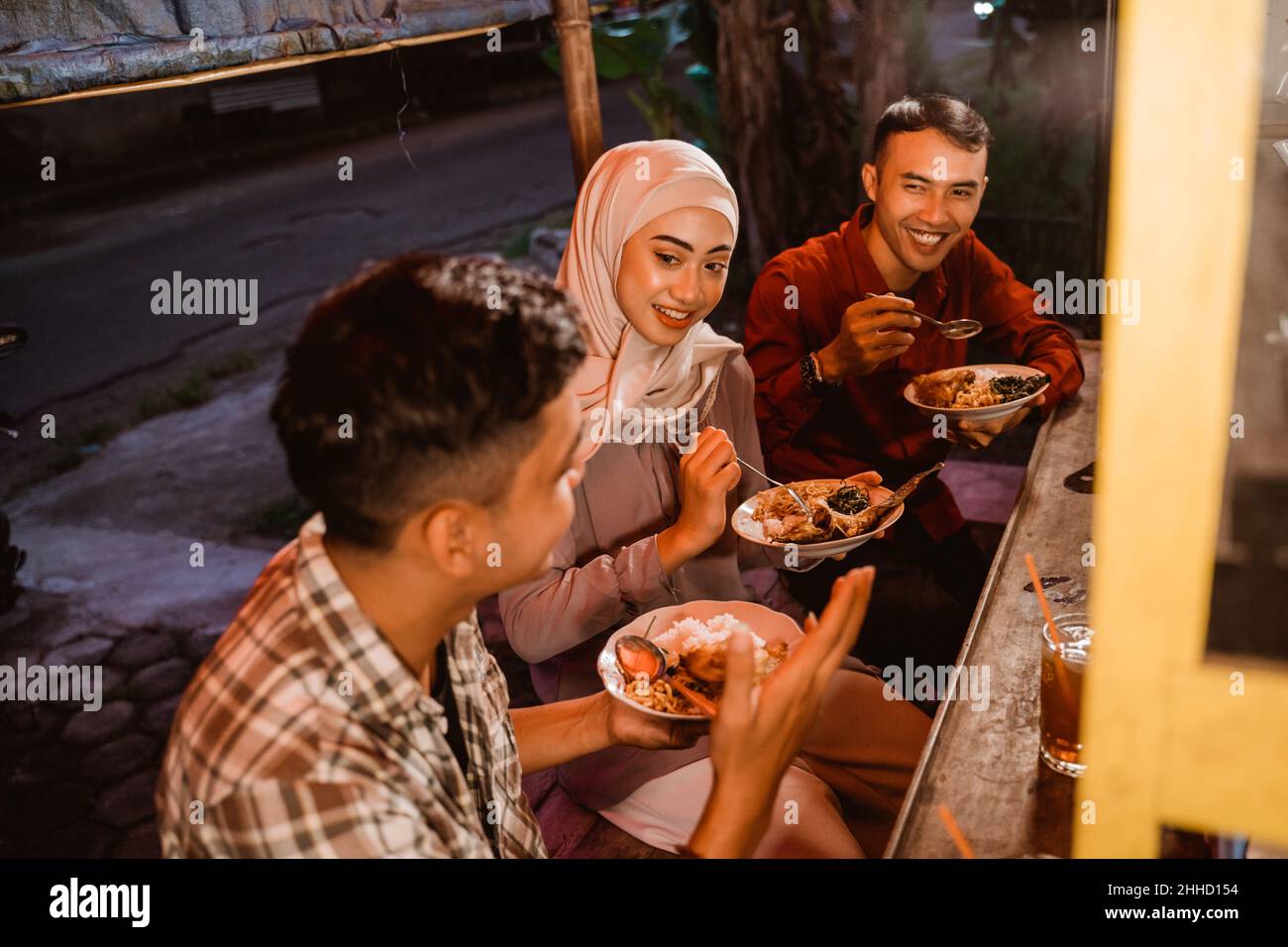 muslim best friend break fasting together during ramadan Stock Photo ...