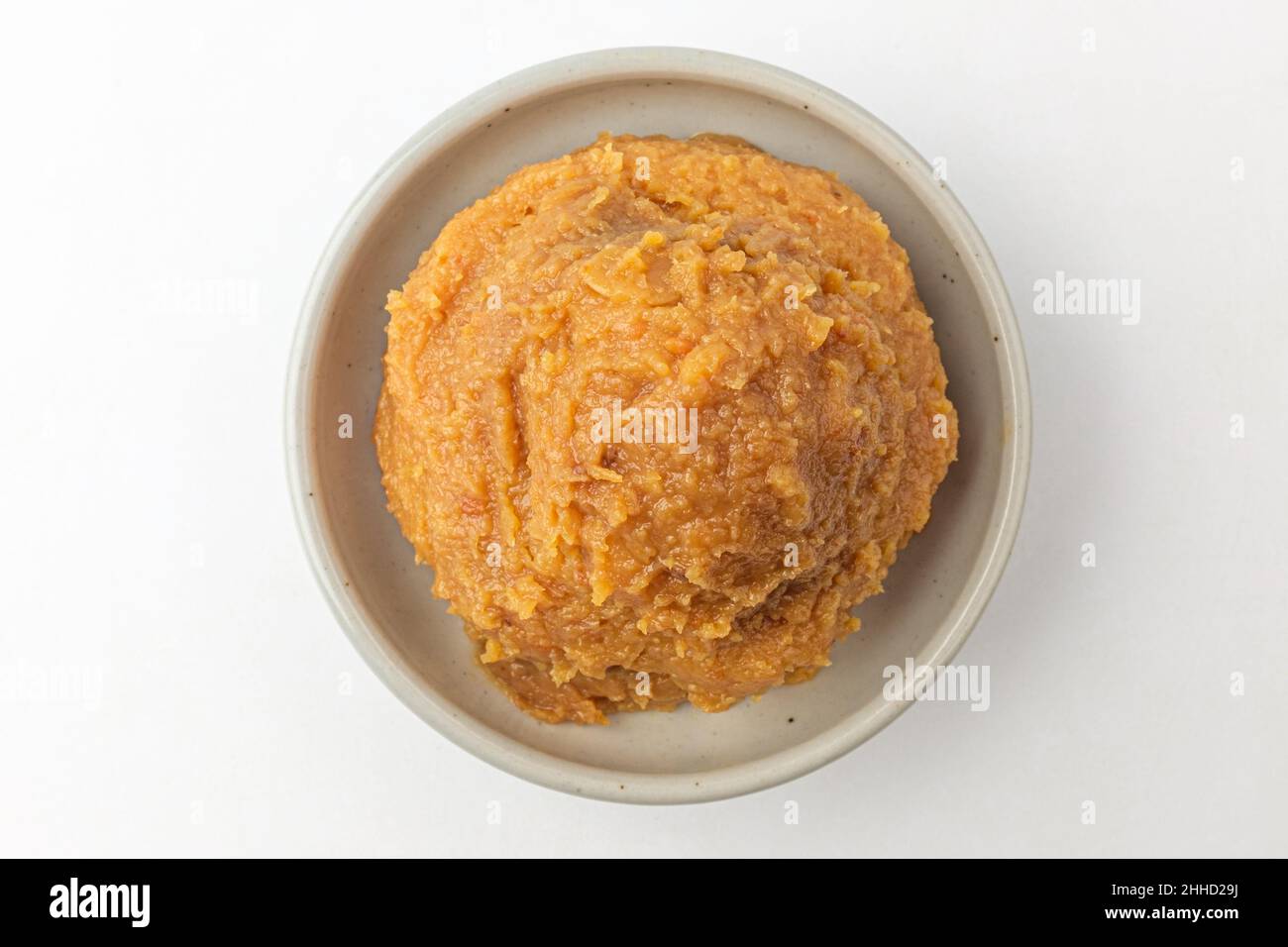 Miso seasoning on a white background Stock Photo - Alamy
