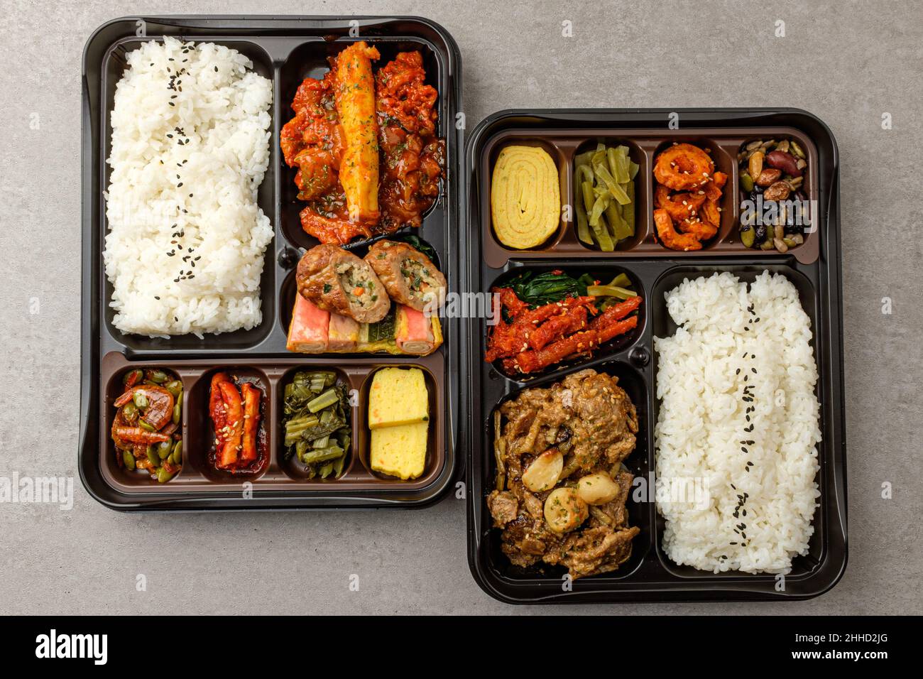 Lunch box with rice, meat and vegetable side dishes Stock Photo - Alamy