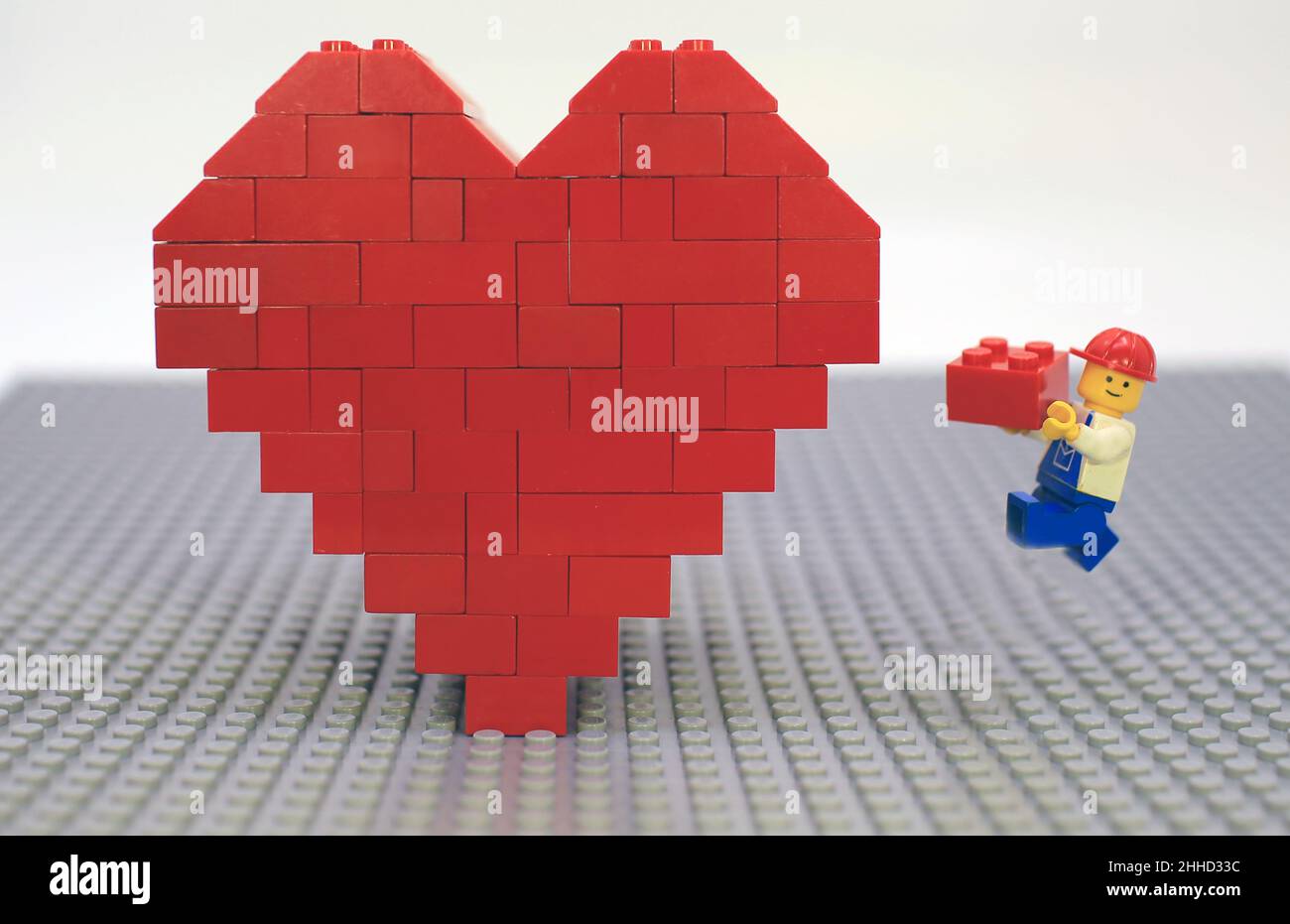 Assemble of red heart in valentines day on lego floor Stock Photo - Alamy