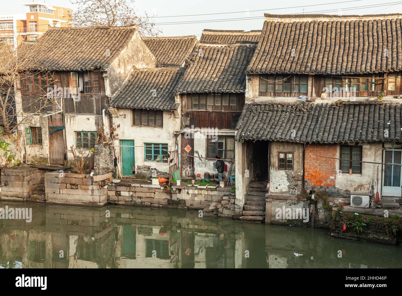 Traditional houses in the old town of Jiashan along a canal. China ...