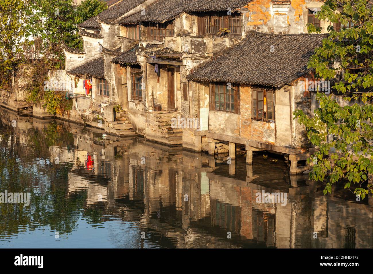 Traditional houses in the old town of Jiashan along a canal. China ...
