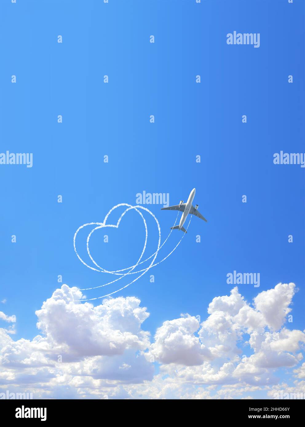 Vertical nature background with aircraft draw a heart in the sky ...