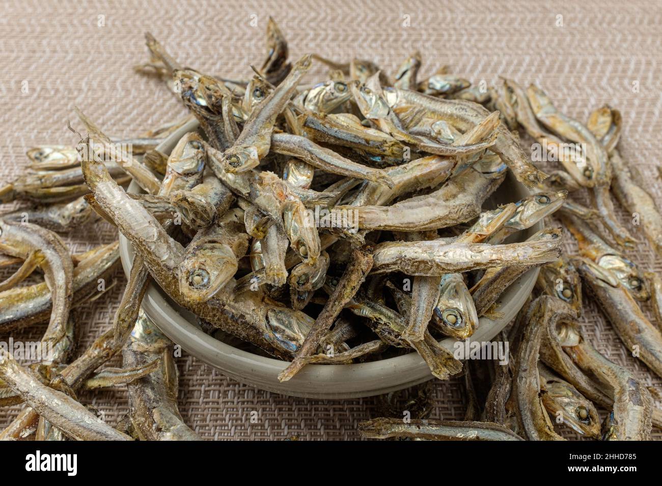 Dried fragrant small fish anchovies Stock Photo - Alamy