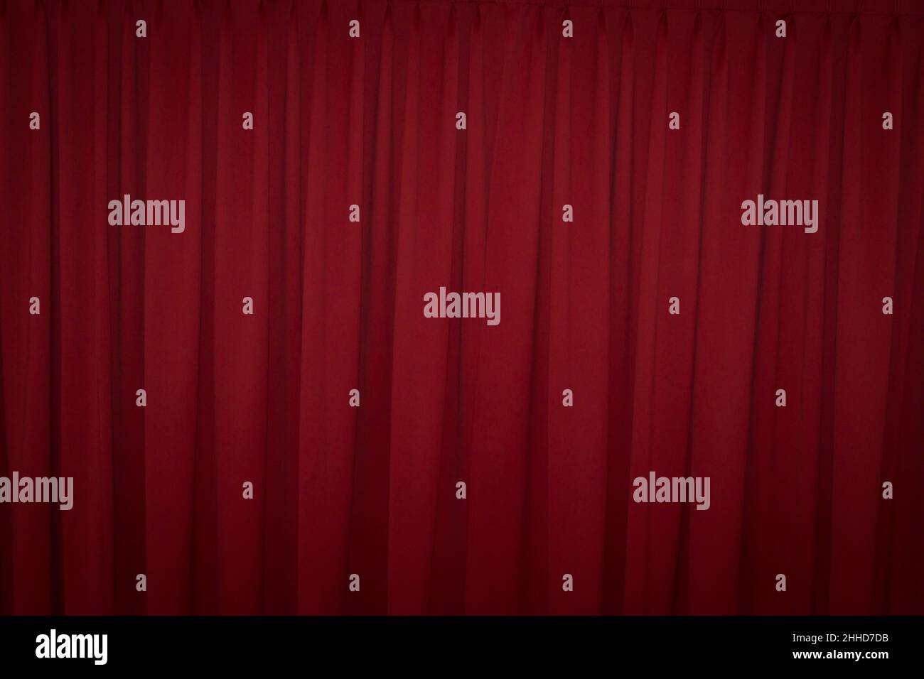 Red closed curtain with a light spot use for background Stock Photo - Alamy