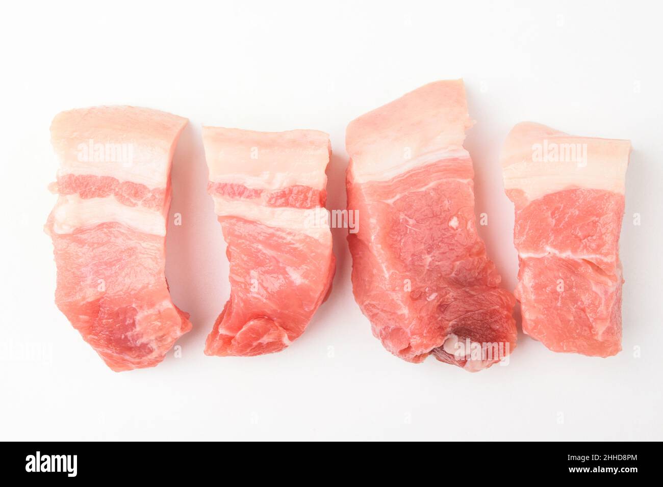 Raw pork. Thinly sliced pork belly. Meat cuts often eaten in Korea ...