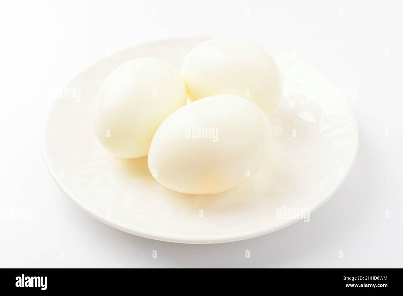 Boiled egg on white background Stock Photo - Alamy