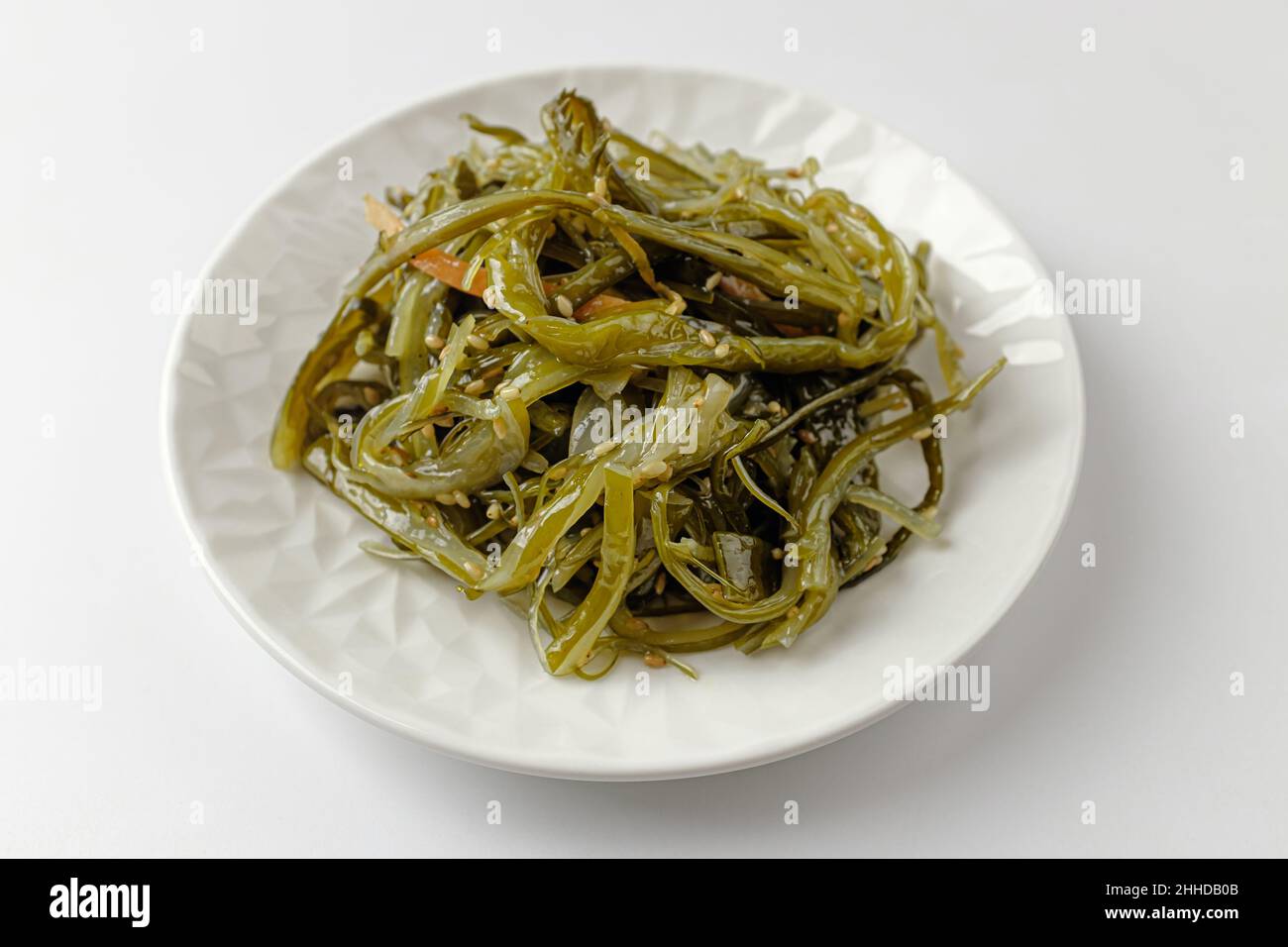 Seaweed stems on a white background Stock Photo - Alamy
