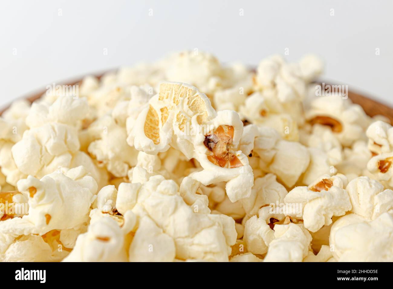 Popcorn made of corn on white background Stock Photo - Alamy