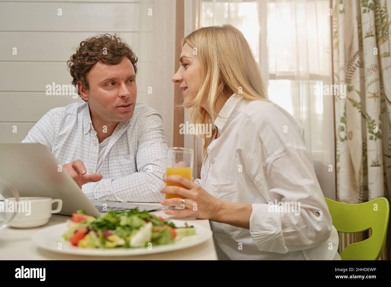 Positive blonde talking partner hi-res stock photography and images - Alamy