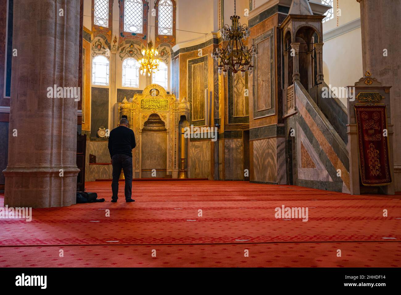 Islamic background photo. Muslim man praying in Molla Zeyrek Mosque ...