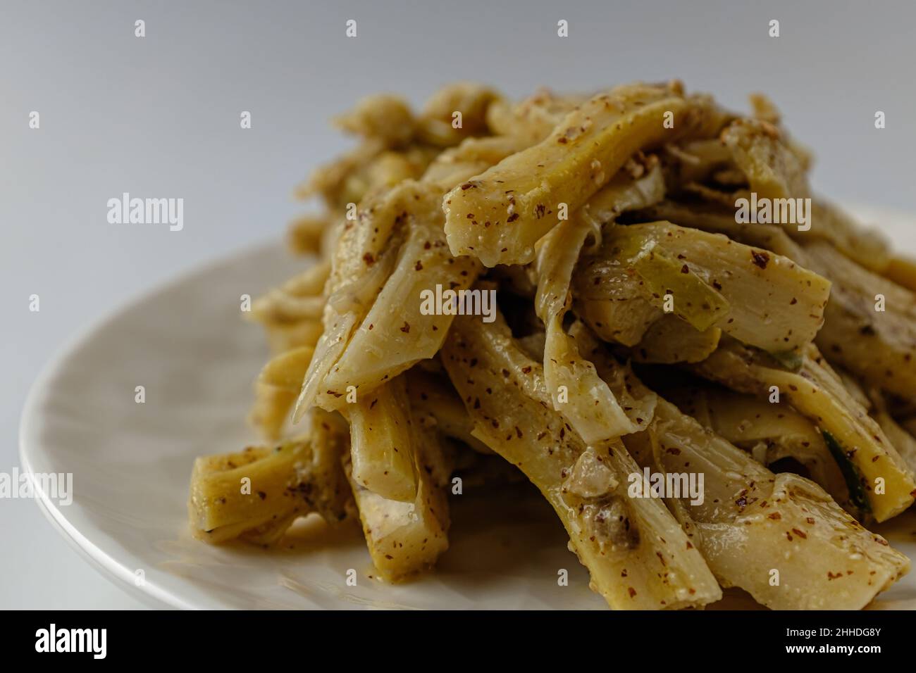Cooking bamboo shoots on a white background Stock Photo - Alamy
