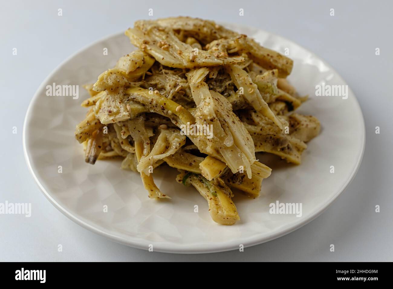 Cooking bamboo shoots on a white background Stock Photo - Alamy