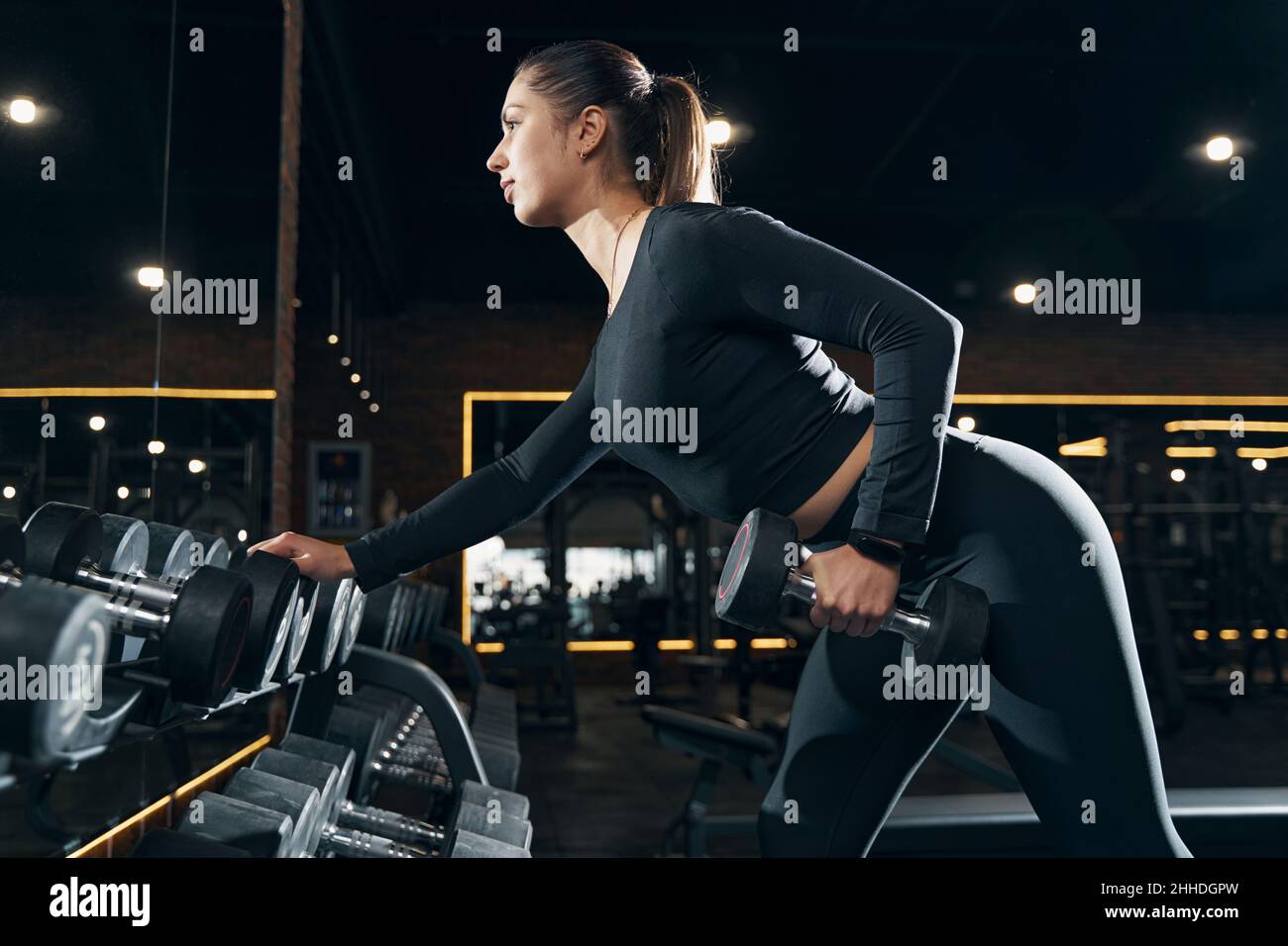 Bent bend over hi-res stock photography and images - Alamy