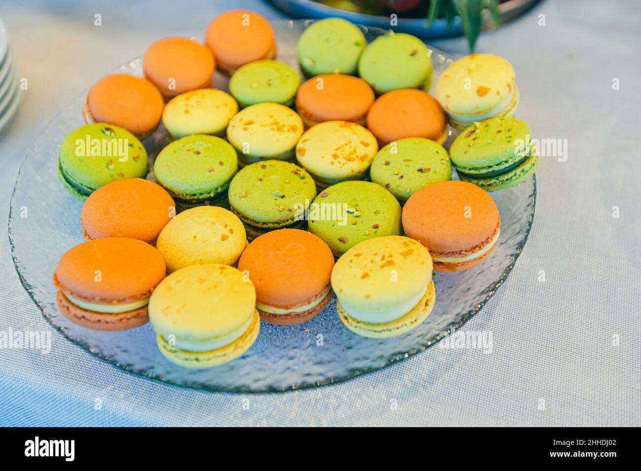 Festive buffet table with delicious desserts of different colors at the ...