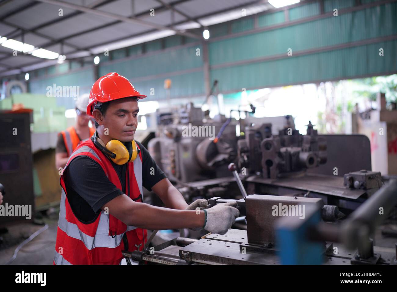 Male engineer metalworker industrial experienced operator technician ...