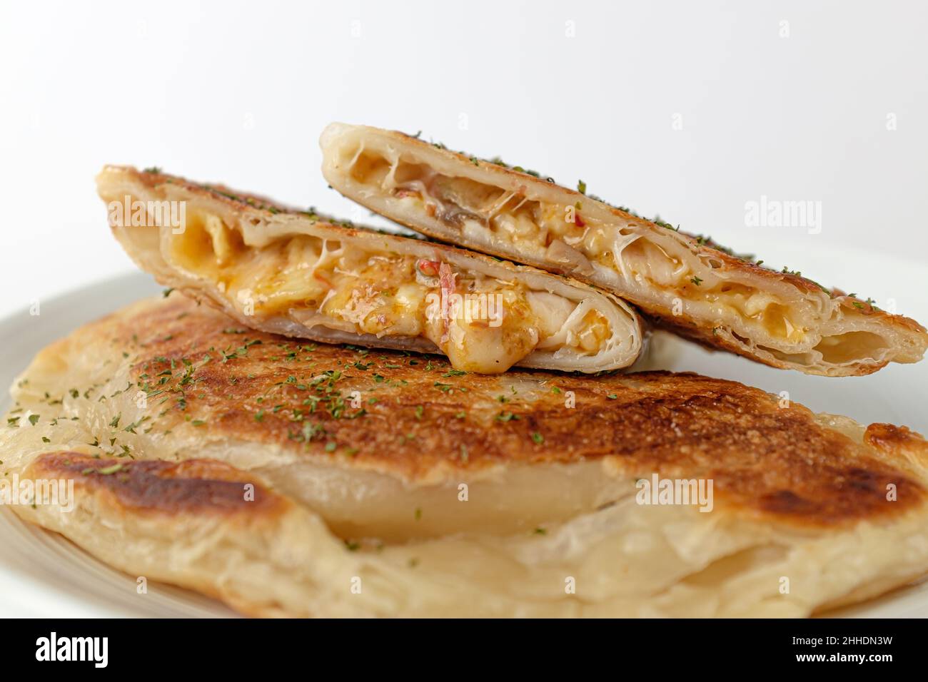 Calzone on a white background Stock Photo - Alamy