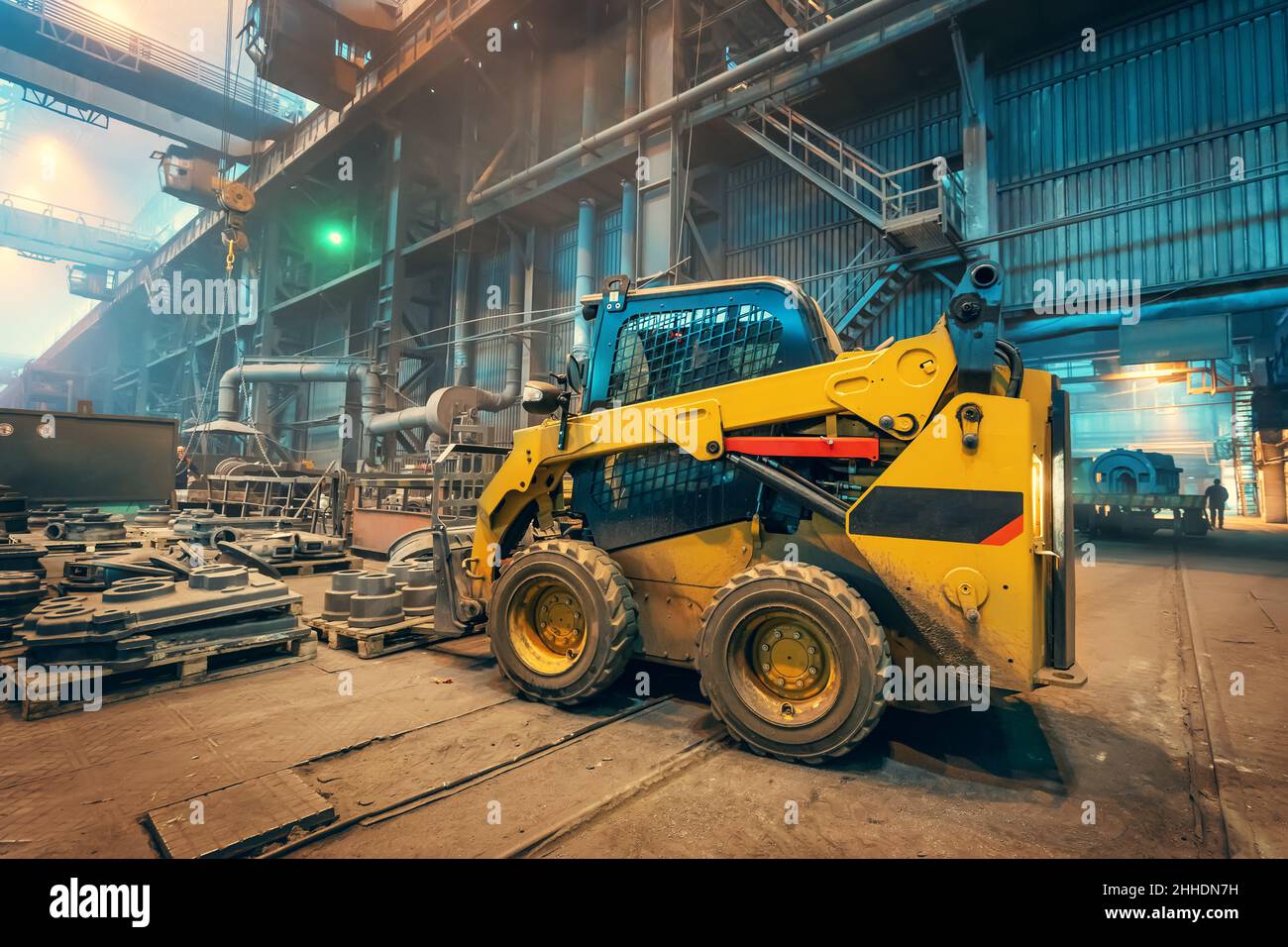 Electric forklift loader inside industrial factory warehouse interior ...