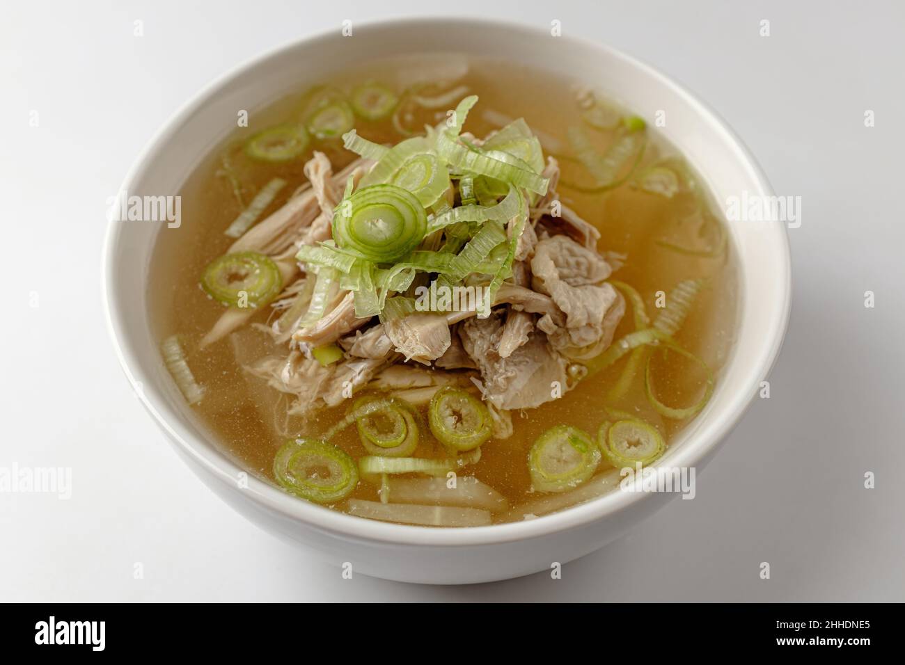 Chicken stock on a white background Stock Photo - Alamy