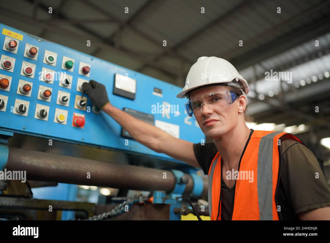 Portrait of Professional Heavy Industry Engineer / Worker Wearing ...