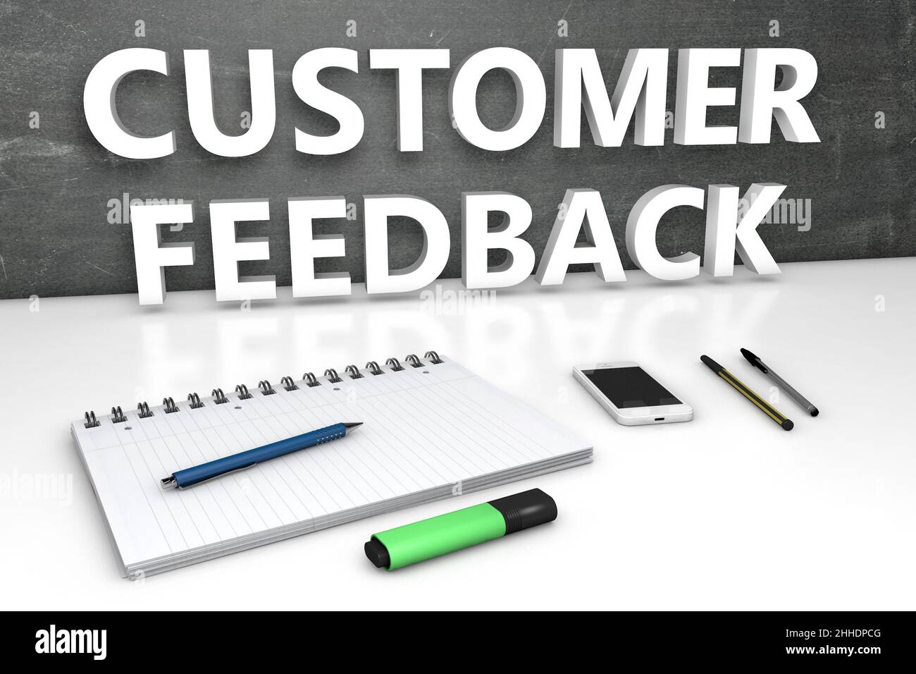 Customer Feedback - text concept with chalkboard, notebook, pens and ...