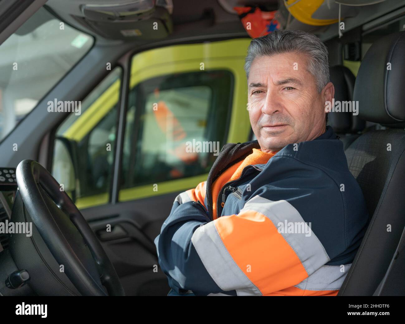 An ambulance driver with his vehicle hi-res stock photography and ...